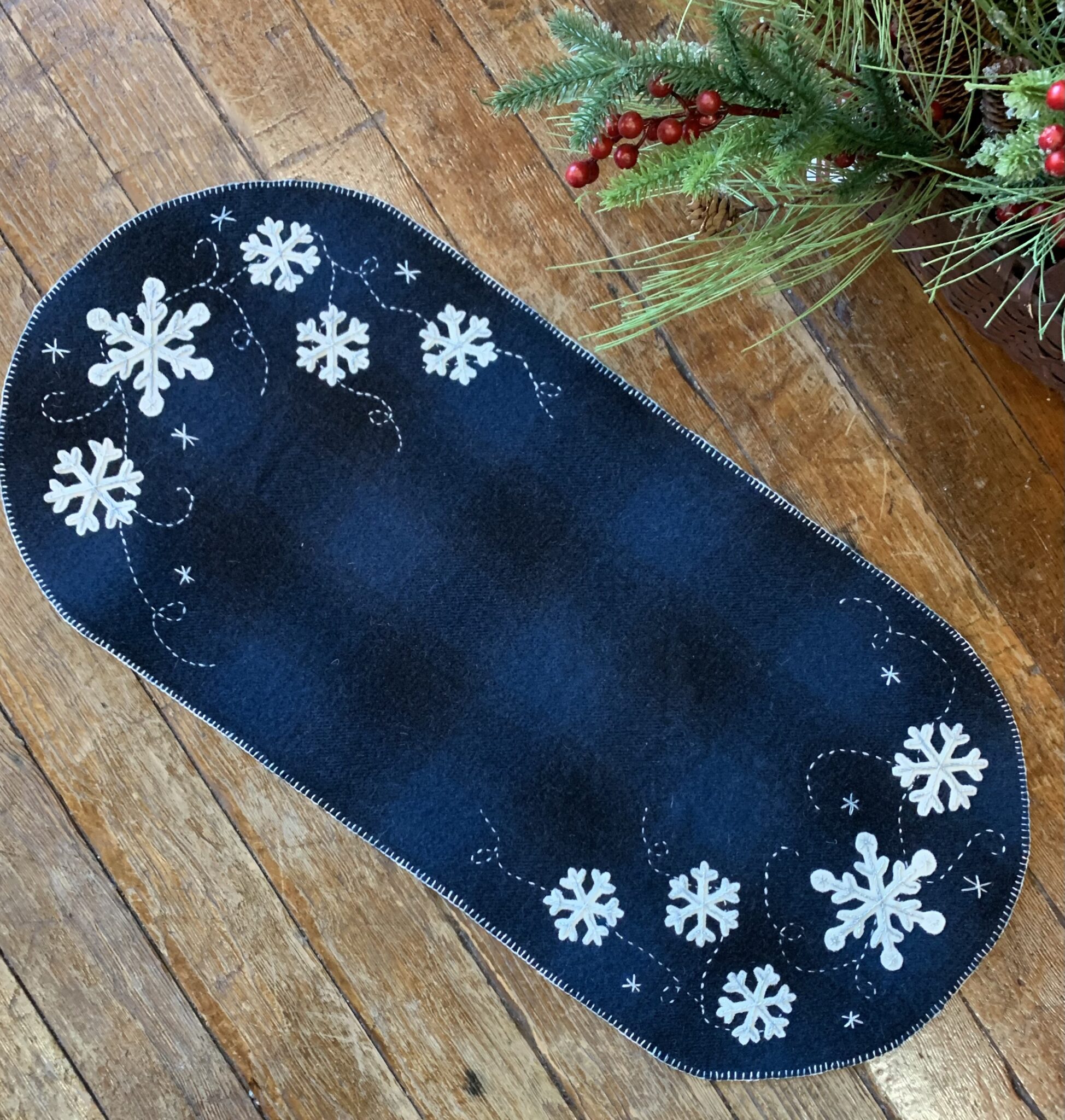 Swirling Snow - The Woolen Needle